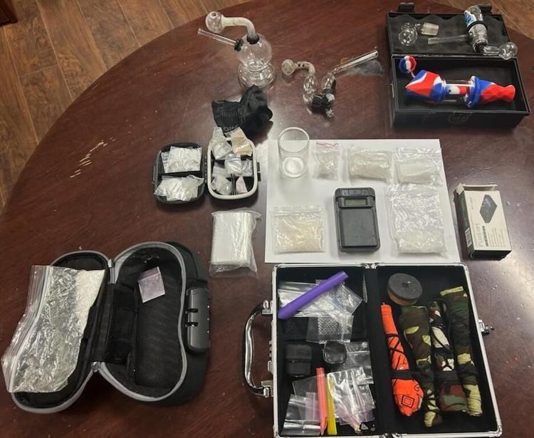 A sword, gun and meth seized from Morganton man