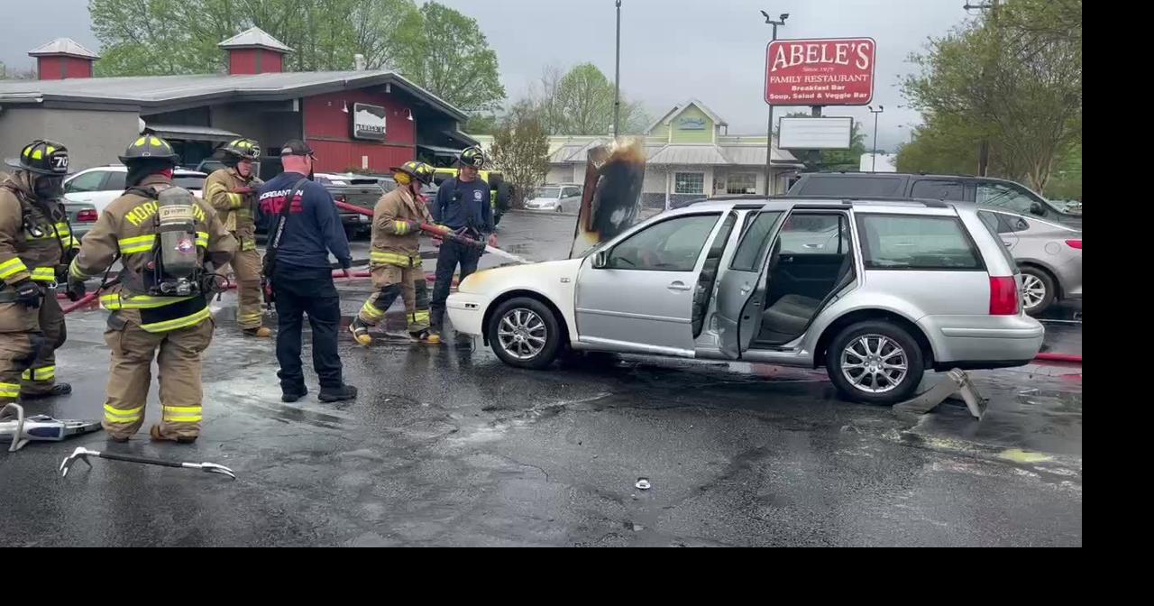 No injuries after car catches fire on South Sterling Street