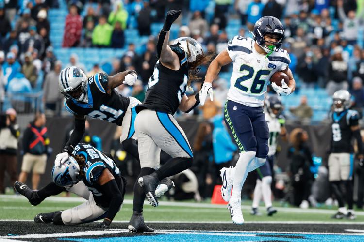 Charlotte's Carolina Panthers fall to Seattle in NFL week 17