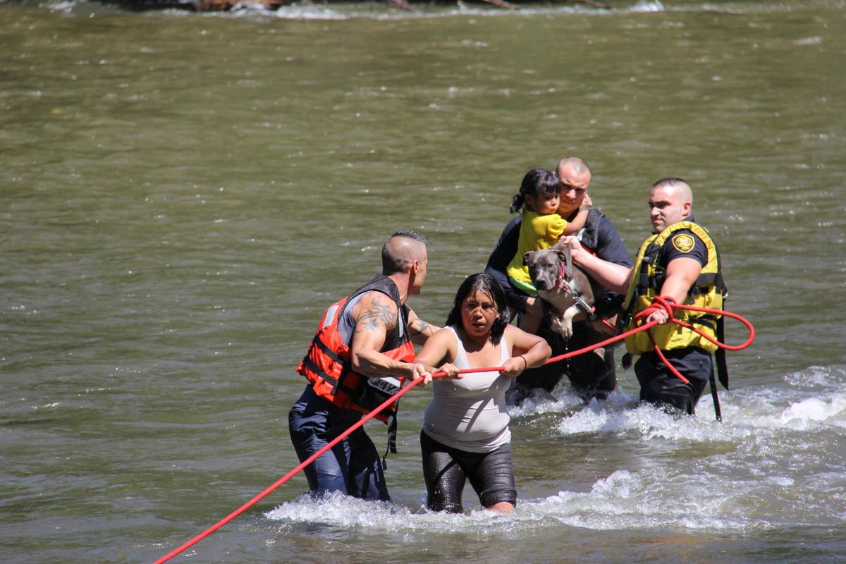 Two families, dog rescued from Catawba River