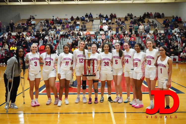 Lady Patriots rally from 4th-quarter deficit to claim tourney title
