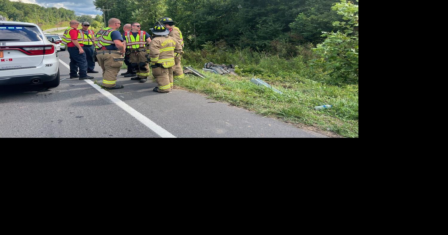 Car flips over guardrail, lands on its roof on NC 18/US 64