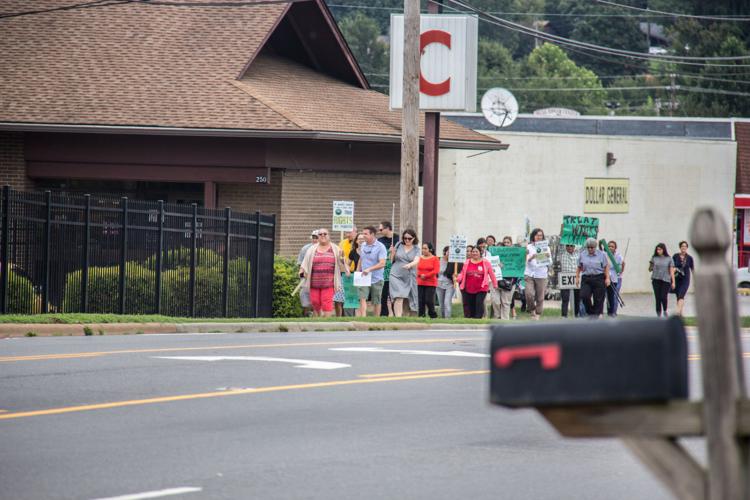Groups protest outside Case Farms for right to use bathroom
