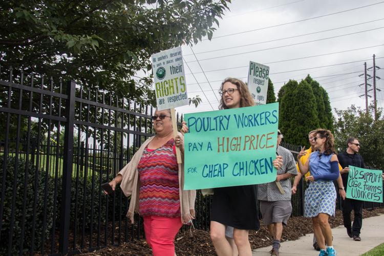 Groups protest outside Case Farms for right to use bathroom