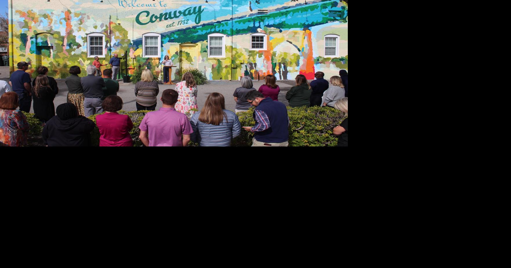 City employees celebrate Conway's newest mural that they helped paint ...