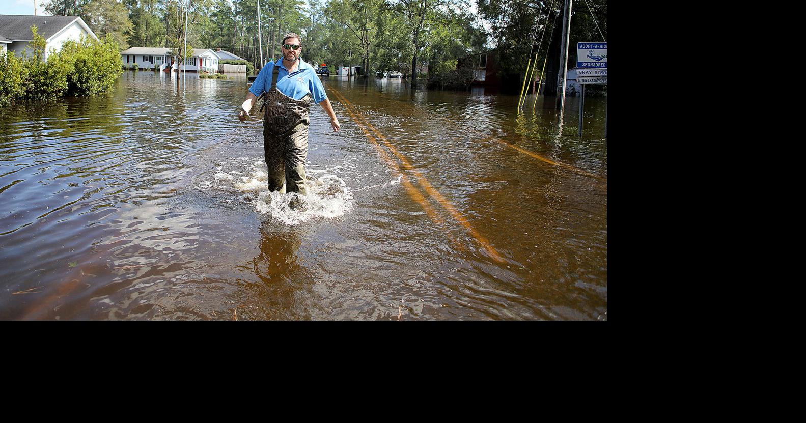 Conway workers keep their city running while their own homes flood ...