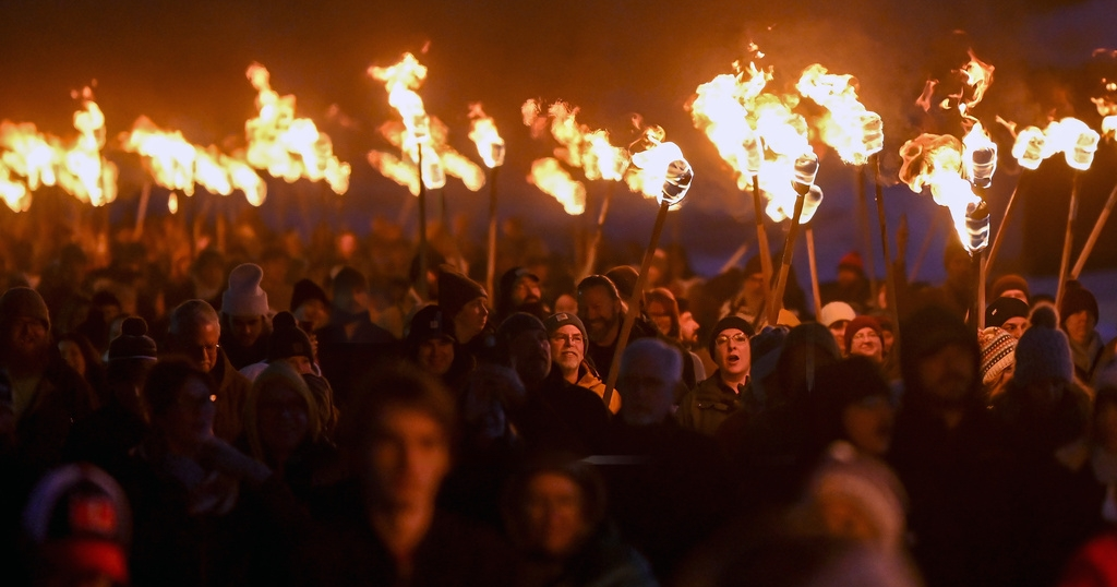 'Burn, beetle, burn': Hundreds of people torch an effigy of destructive ...