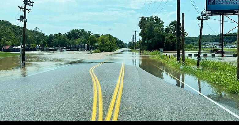 Three people helped from vehicles during flash flooding in Fenton area ...