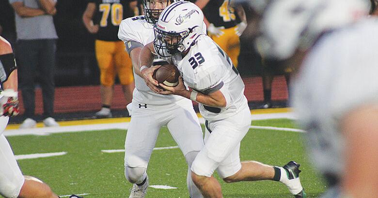 Schmidt assumes dual roles as head football coach, AD | Sports ...