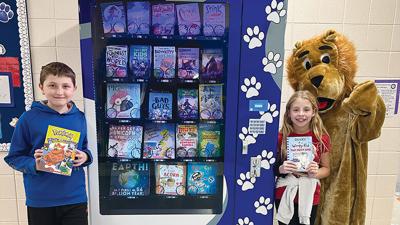 Cedar Springs rewards students with book vending machine | Local News ...
