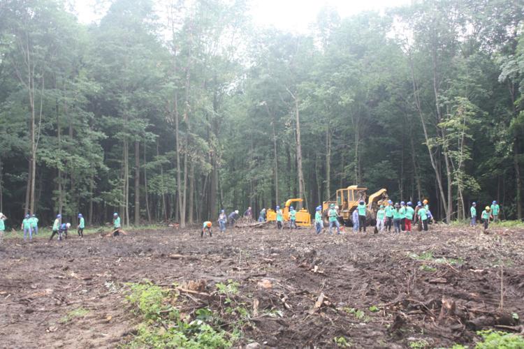 Volunteers lend a helping hand at Habitat project | Top Stories ...