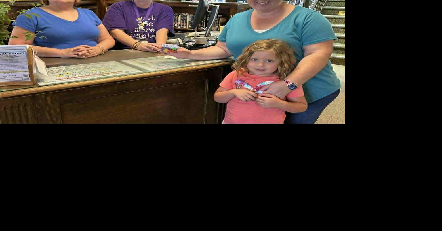 Local library card travels well; on display at a Long Island library ...