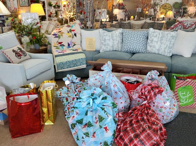 Village Furniture and Design, local groups help gather gifts for ...