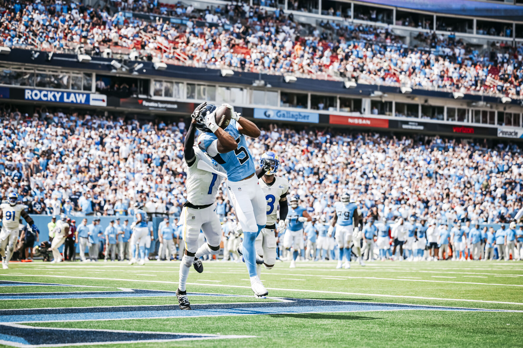 Titans' Elic Ayomanor showing a knack for the contested catch ...