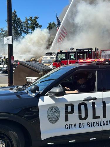 Fire at known hoarder house in Richland contained, cause under ...