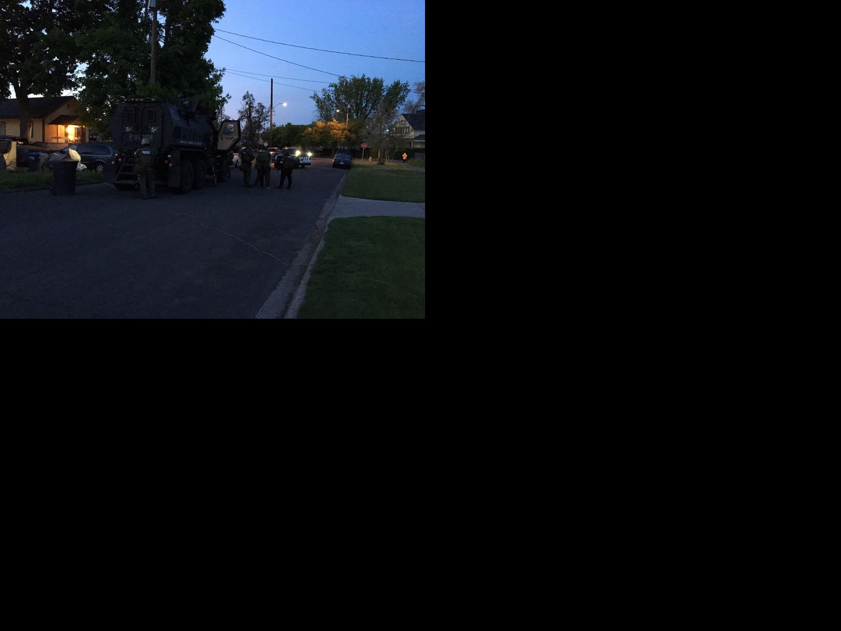 SWAT standoff after a report of gunshot through apartment building ...