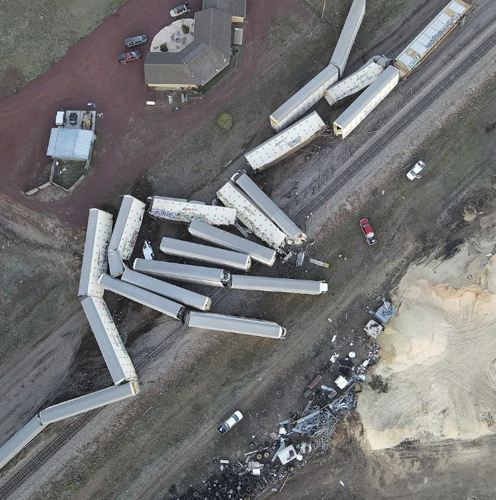 23 freight cars, new vehicles heavily damaged in train derailment in ...