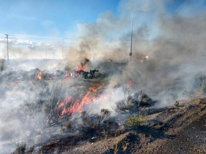 Crews fight fire along Highway 12 after two wildfires merge | News ...