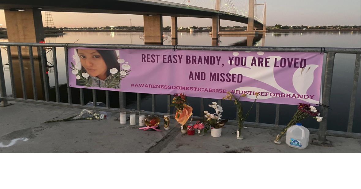 Woman found in river was pregnant, wrapped, bound; suspect in custody ...