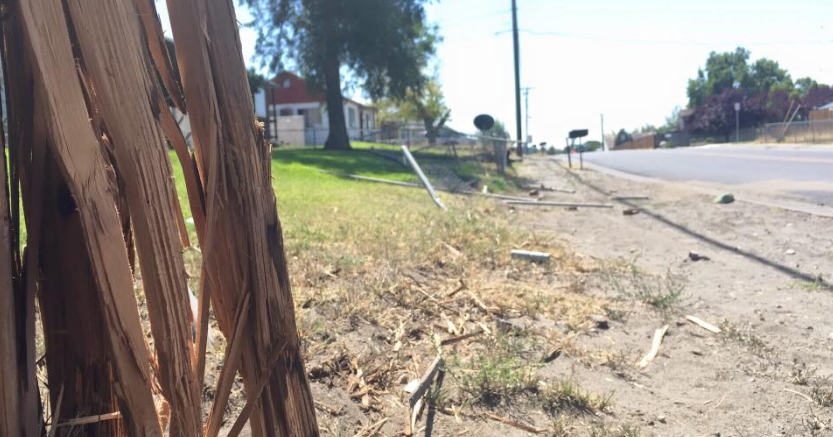 Three children injured in front yard when car crashes through fence ...