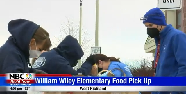 William Wiley Elementary staff and parents join to hand out food to ...