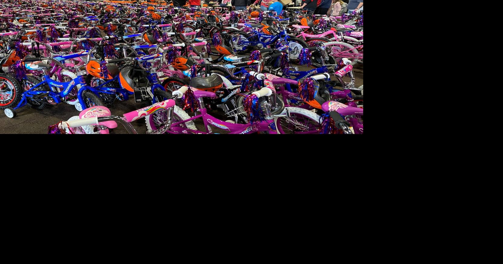 Volunteers build 1.5K bikes in four hours at Bike Build 2022 ...