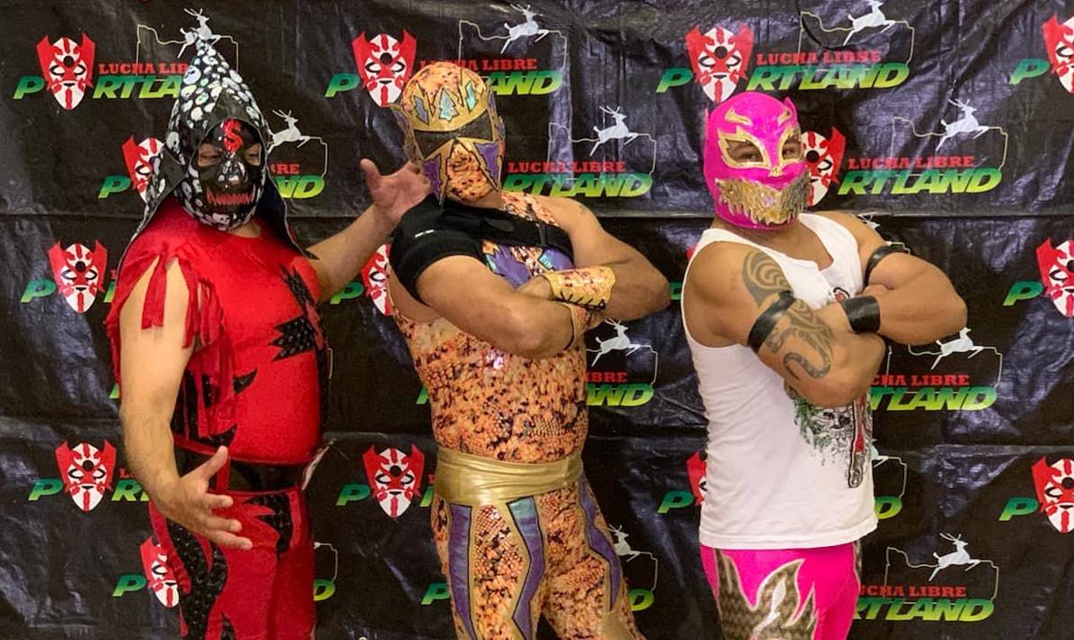 DPDA handing out "Lucha Libre" masks to encourage people to wear masks ...