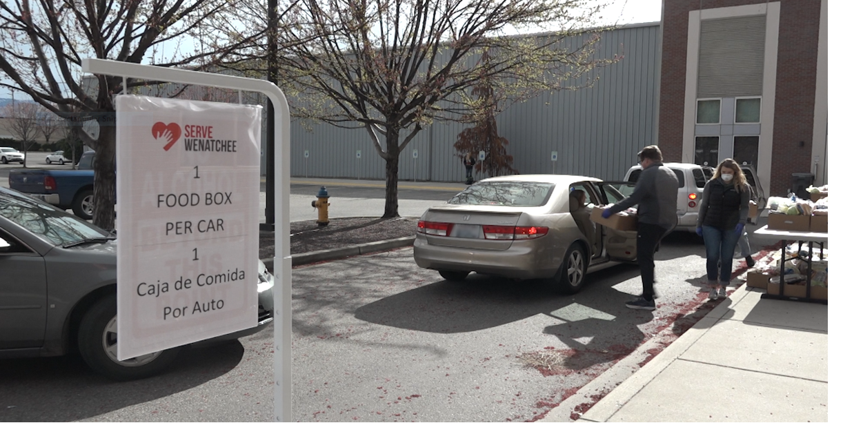 Food distribution center drive through set up to safely serve the ...