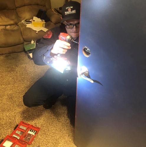 Firefighters break door to rescue man, then repair the door | Wenatchee ...