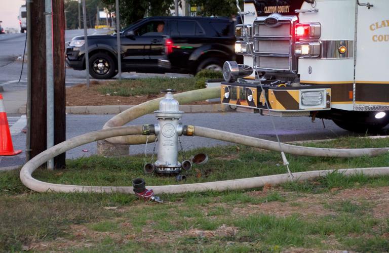 PHOTOS: Firefighters snuff smoky blaze at empty apartment building near ...