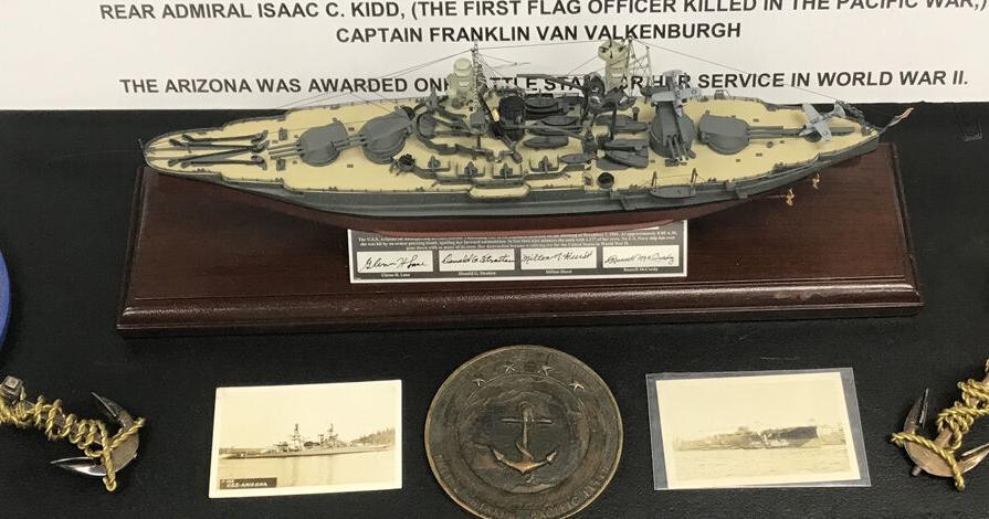 Superstructure pieces, sword from USS Arizona at Pearl Harbor display ...