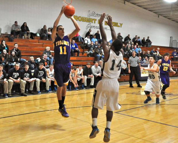 Boys Regional Basketball: Trojans season comes to end with 62-35 loss ...