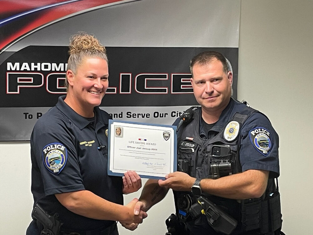 Mahomet police officer, civilian to be lauded for saving motorist from ...