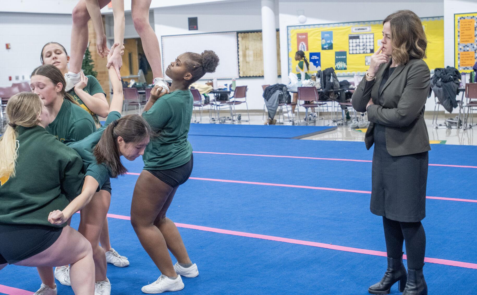 Beyond the Boardroom: Champaign attorney and STM cheer coach Sami ...