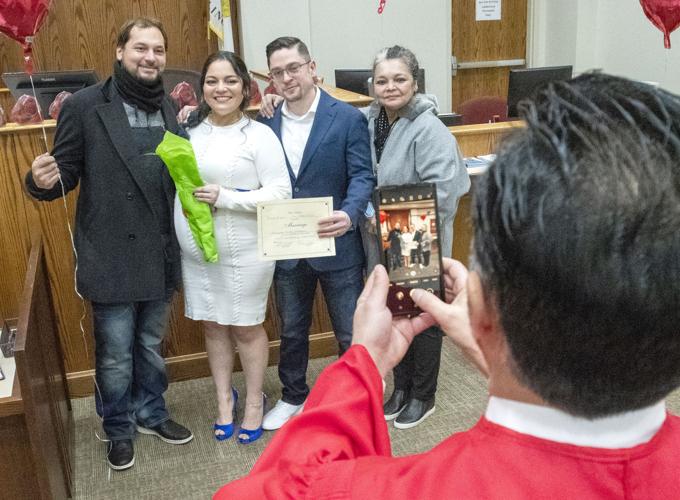 Courthouse wedding couples greeted with extra frills on Valentine's Day ...