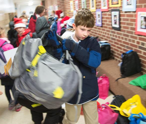 Holy Cross kids help soup kitchen, one backpack at a time | News | news ...