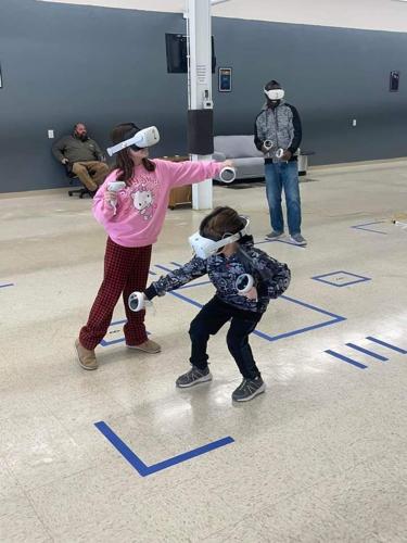 Father-son duo open virtual-reality 'funhouse' in former Tuesday ...