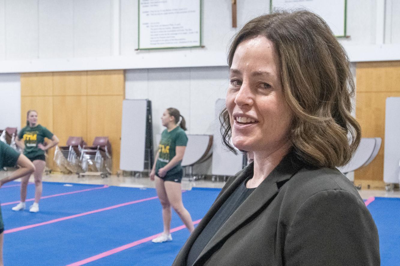 Beyond the Boardroom: Champaign attorney and STM cheer coach Sami ...