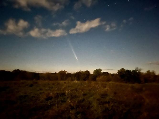 Viewers capture photos of rare comet passing by Earth in October ...