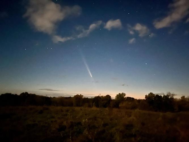 Viewers capture photos of rare comet passing by Earth in October ...