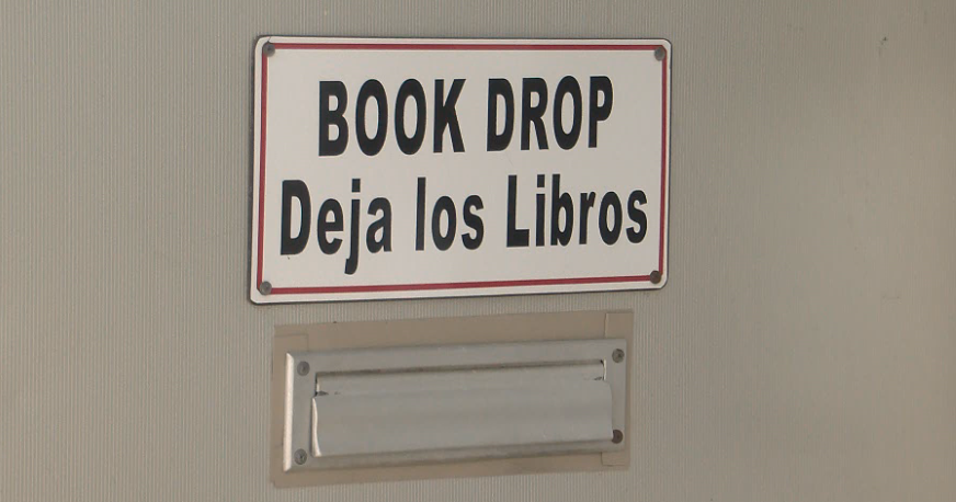 Community members, students help Whitehall library move books into new ...