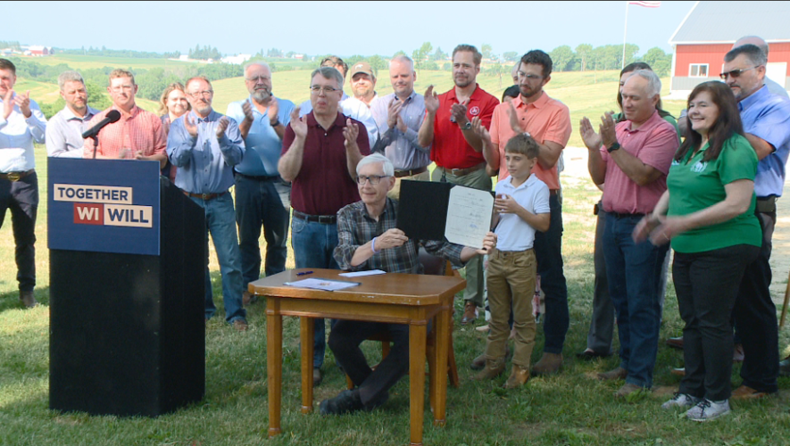 Gov. Evers signs $150M bill to fund rural road improvements | Local ...