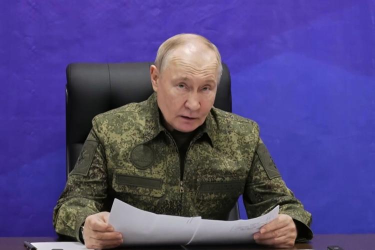 The message behind Putin’s camouflage-clad claim of victory in a key ...