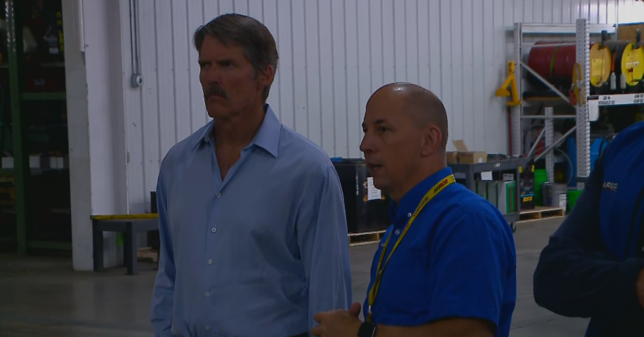 Eric Hovde discusses policy with employees at Menards Headquarters ...