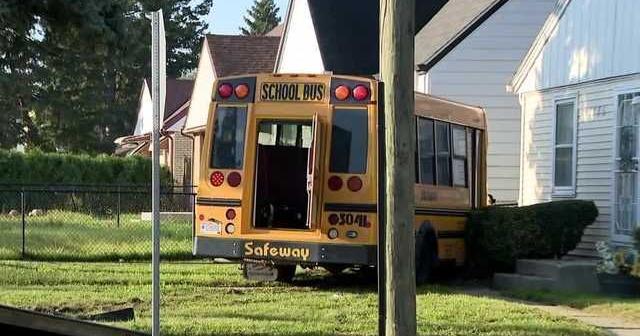 'It was a big boom': SUV hits school bus, sending it into family's ...