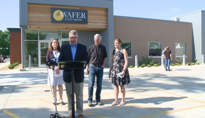 La Crosse area Democrats address budget cuts at Wafer Food Pantry press ...