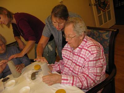 Residents of local assisted living facility use art to stay engaged