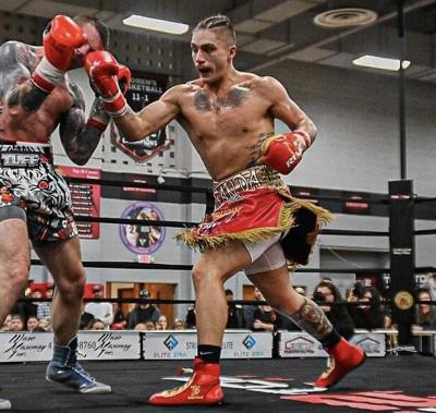 Amherst boxer earns victory via corner stoppage, improves record to 11-0