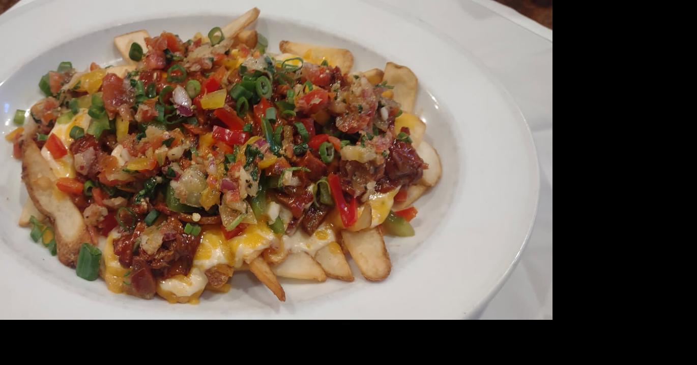 New menu offerings at Waterstone Pizza, such as Thai pizza