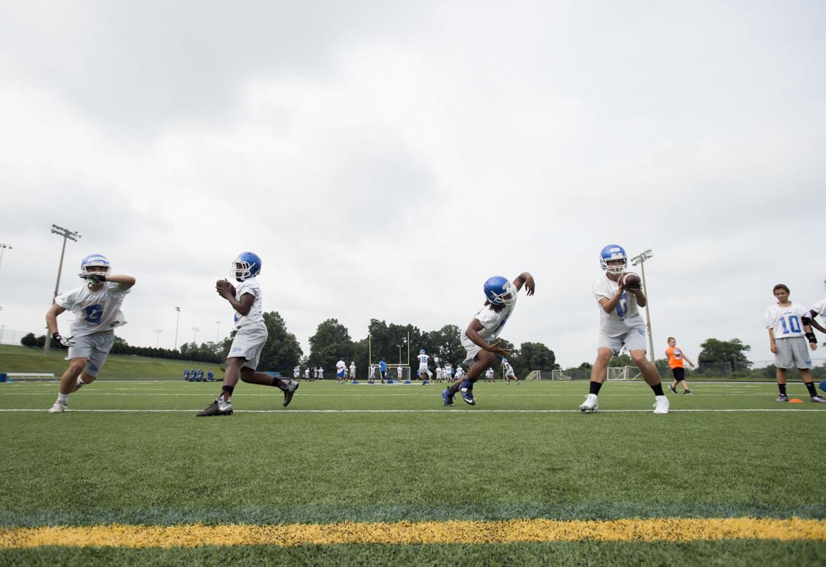 Photos: E.C. Glass, Heritage football practice